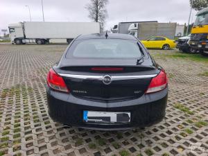 Black Opel Insignia 2008 in Vilnius, with an engine capacity of 2.00 L and mileage of 230 thousand km for 1950 €, photo 7 on AUTOMOTO.COM.LV