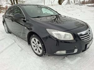 Black Opel Insignia 2009 in Plunge, with an engine capacity of 1.96 L and mileage of 329 thousand km for 2100 €, photo 13 on AUTOMOTO.COM.LV