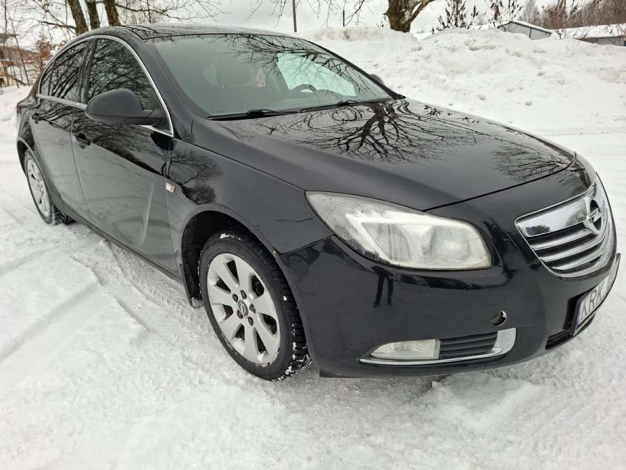 Black Opel Insignia 2009 in Plunge, with an engine capacity of 1.96 L and mileage of 329 thousand km for 2100 €, photo 13 on AUTOMOTO.COM.LV