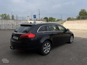 Black Opel Insignia 2009 in Alytus, with an engine capacity of 2.00 L and mileage of 310 thousand km for 1950 €, photo 4 on AUTOMOTO.COM.LV