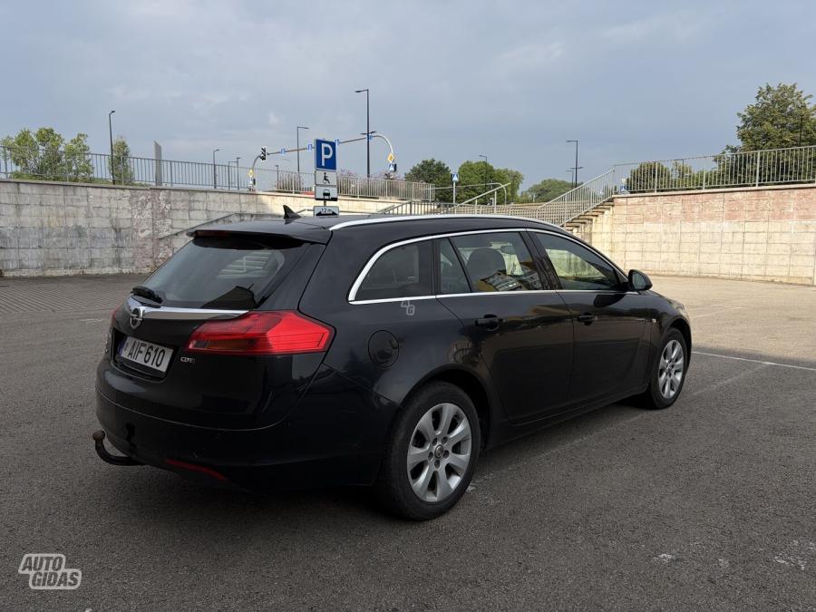 Black Opel Insignia 2009 in Alytus, with an engine capacity of 2.00 L and mileage of 310 thousand km for 1950 €, photo 4 on AUTOMOTO.COM.LV