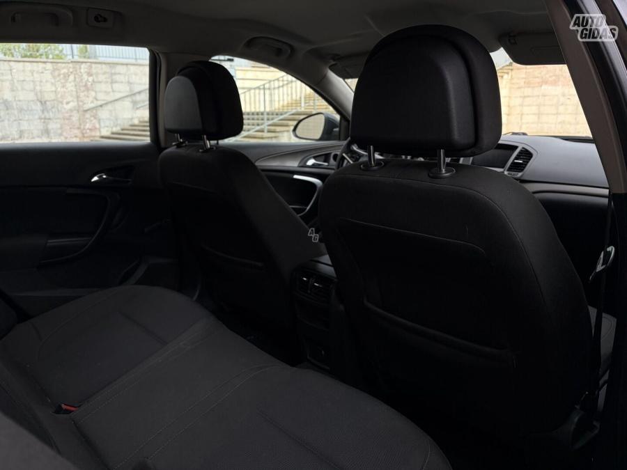 Black Opel Insignia 2009 in Alytus, with an engine capacity of 2.00 L and mileage of 310 thousand km for 1950 €, photo 11 on AUTOMOTO.COM.LV