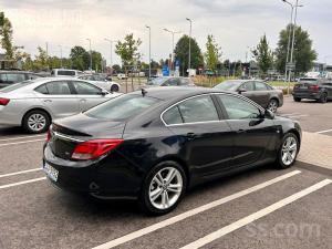 Black Opel Insignia 2009 in Riga, with an engine capacity of 2.00 L and mileage of 283 thousand km for 1300 €, photo 3 on AUTOMOTO.COM.LV