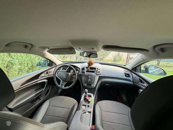 Black Opel Insignia 2009 in Kedainiai, with an engine capacity of 1.96 L and mileage of 194 thousand km for 2400 €, photo 11 on AUTOMOTO.COM.LV