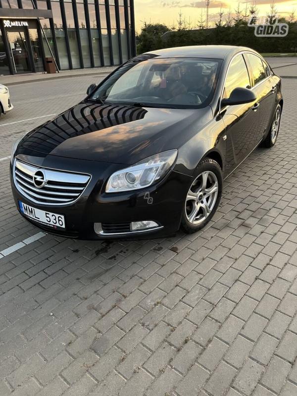 Black Opel Insignia 2009 in Kaunas, with an engine capacity of 2.00 L and mileage of 335 thousand km for 2000 €, photo 1 on AUTOMOTO.COM.LV