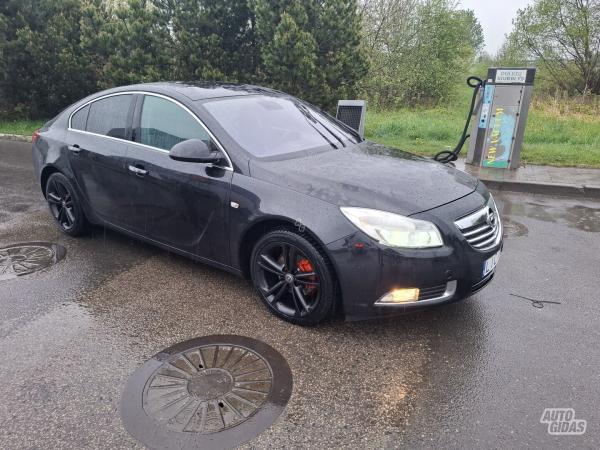 Black Opel Insignia 2010 in Klaipeda, with an engine capacity of 2.00 L and mileage of 230 thousand km for 2900 €, photo 6 on AUTOMOTO.COM.LV