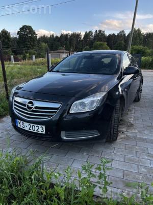 Black Opel Insignia 2010 in Riga, with an engine capacity of 2.00 L and mileage of 256 thousand km for 1600 €, photo  on AUTOMOTO.COM.LV