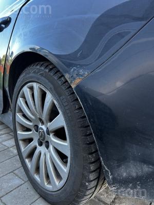 Black Opel Insignia 2010 in Riga, with an engine capacity of 2.00 L and mileage of 256 thousand km for 1600 €, photo 15 on AUTOMOTO.COM.LV