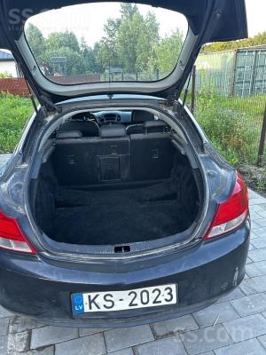 Black Opel Insignia 2010 in Riga, with an engine capacity of 2.00 L and mileage of 256 thousand km for 1600 €, photo 20 on AUTOMOTO.COM.LV