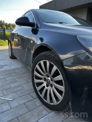 Black Opel Insignia 2010 in Riga, with an engine capacity of 2.00 L and mileage of 256 thousand km for 1600 €, photo 29 on AUTOMOTO.COM.LV