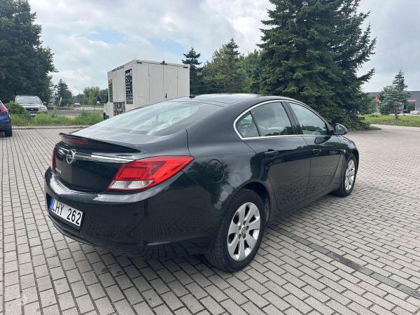 Melns Opel Insignia 2010 Kauņa, ar dzinēja tilpumu 1.80 L un nobraukumu 161 tūkst. km par 3700 €, foto 6 vietnē AUTOMOTO.COM.LV