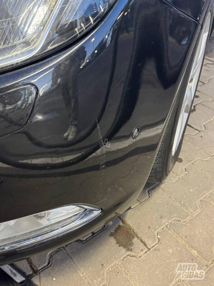 Black Opel Insignia 2011 in Vilnius, with an engine capacity of 2.00 L and mileage of 340 thousand km for 3500 €, photo 26 on AUTOMOTO.COM.LV