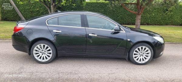 Black Opel Insignia 2011 in Kedainiai, with an engine capacity of 2.00 L and mileage of 272 thousand km for 3399 €, photo 6 on AUTOMOTO.COM.LV