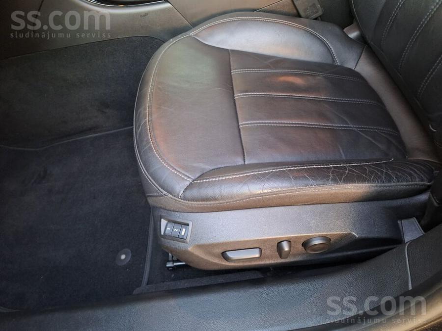 Black Opel Insignia 2011 in Gulbene, with an engine capacity of 2.00 L and mileage of 231 thousand km for 4700 €, photo 11 on AUTOMOTO.COM.LV