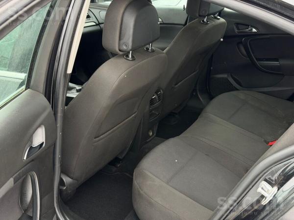Black Opel Insignia 2011 in Riga, with an engine capacity of 2.00 L and mileage of 312 thousand km for 3280 €, photo 9 on AUTOMOTO.COM.LV