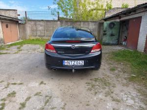 Black Opel Insignia 2011 in Klaipeda, with an engine capacity of 1.96 L and mileage of 307 thousand km for 3000 €, photo 5 on AUTOMOTO.COM.LV