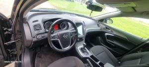Black Opel Insignia 2011 in Kedainiai, with an engine capacity of 2.00 L and mileage of 272 thousand km for 3199 €, photo 13 on AUTOMOTO.COM.LV