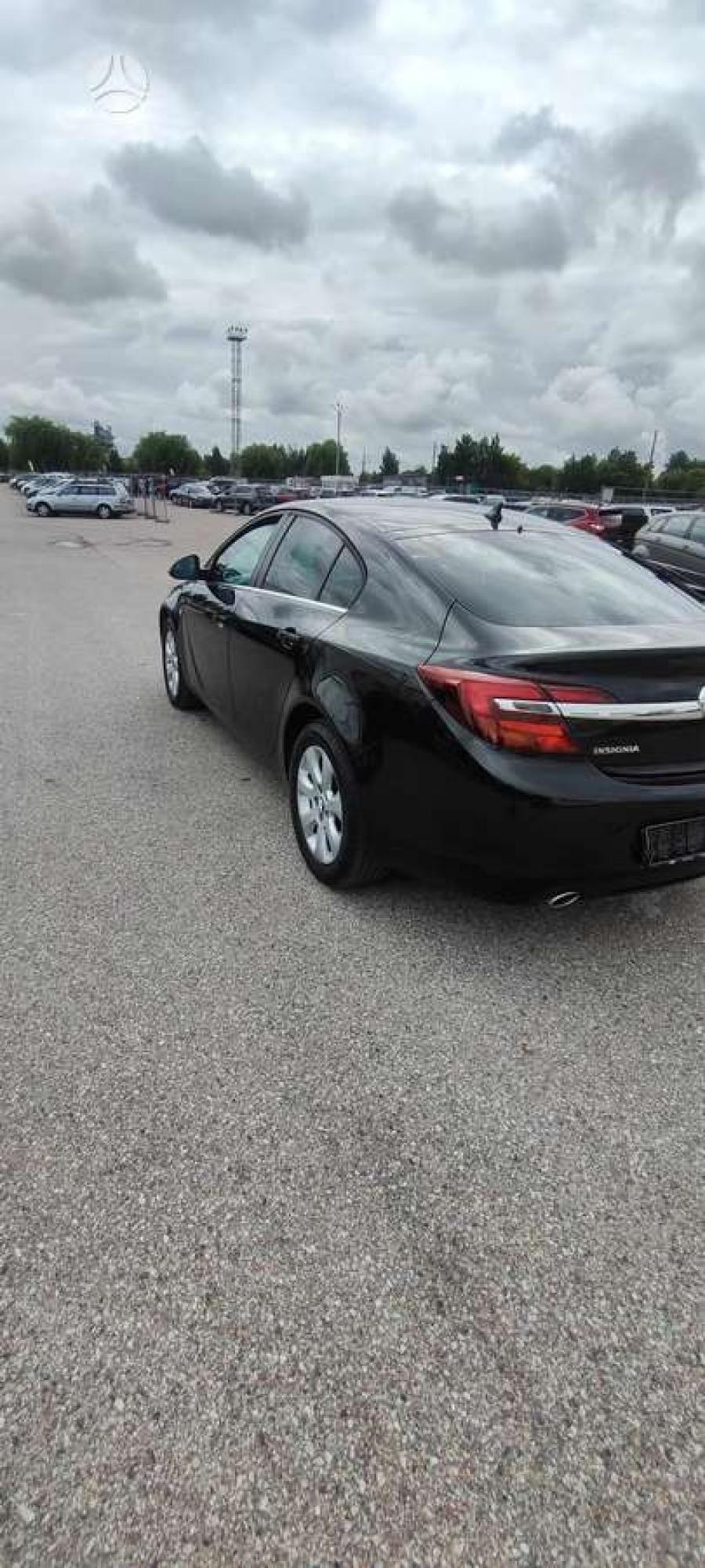 Black Opel Insignia 2014 in Marijampole, with an engine capacity of 2.00 L and mileage of 265 thousand km for 4999 €, photo 5 on AUTOMOTO.COM.LV