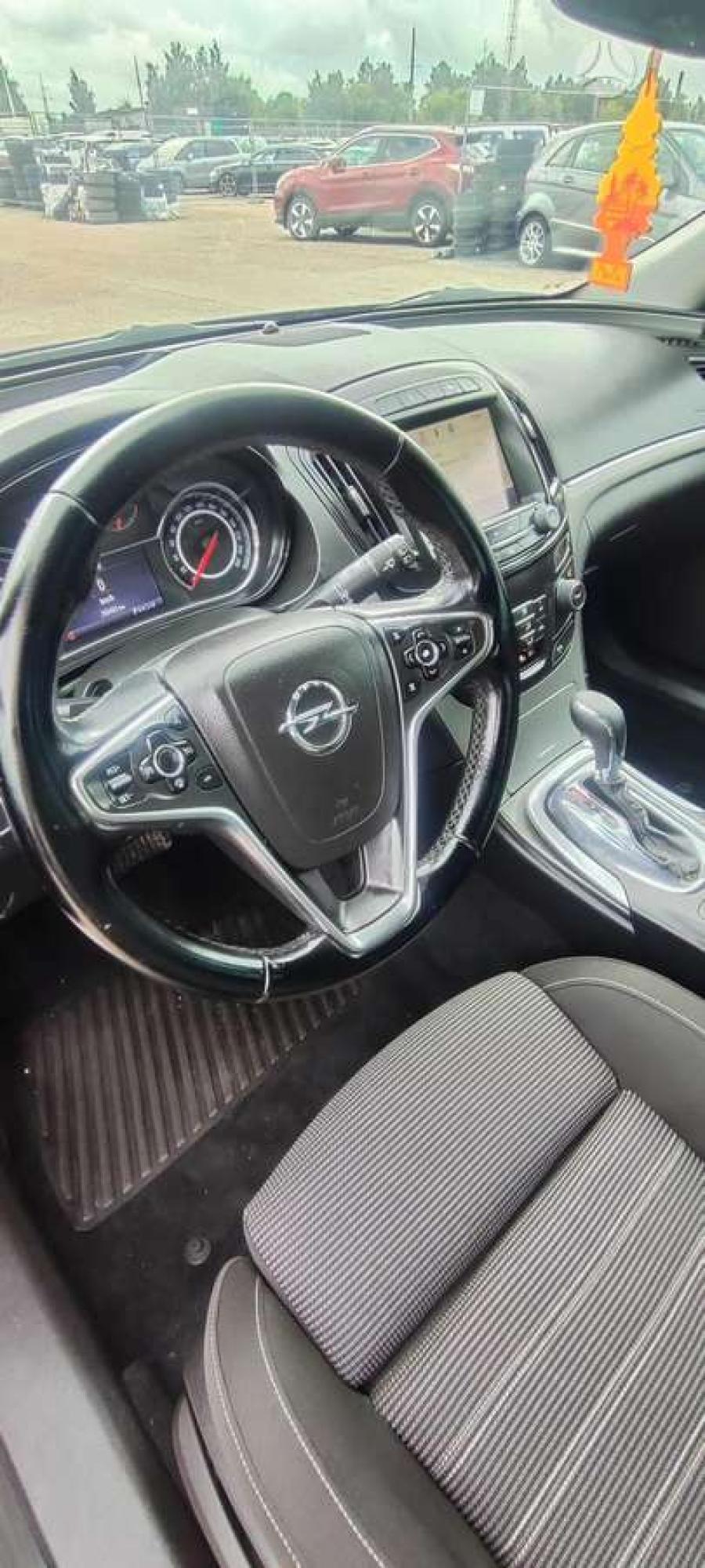 Black Opel Insignia 2014 in Marijampole, with an engine capacity of 2.00 L and mileage of 265 thousand km for 4999 €, photo 9 on AUTOMOTO.COM.LV