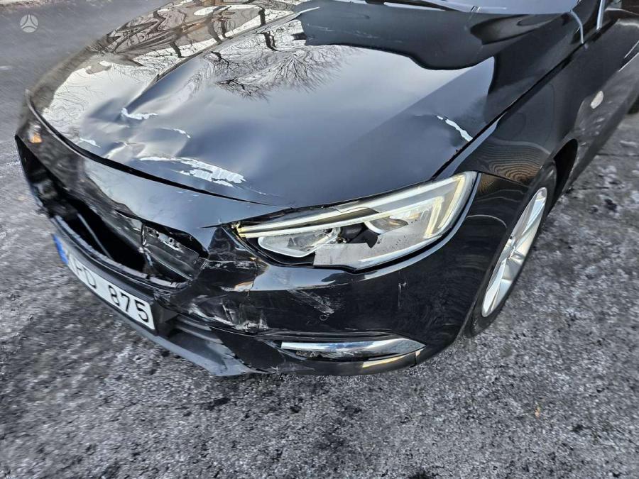Black Opel Insignia 2018 in Kaunas, with an engine capacity of 1.49 L and mileage of 114 thousand km for 4400 €, photo 11 on AUTOMOTO.COM.LV