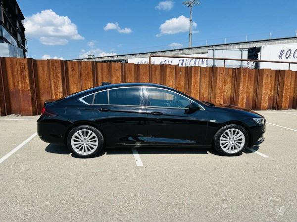 Black Opel Insignia 2018 in Kaunas, with an engine capacity of 1.60 L and mileage of 219 thousand km for 10499 €, photo 6 on AUTOMOTO.COM.LV
