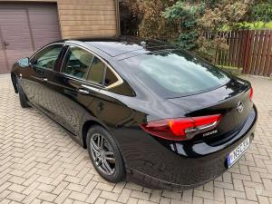 Black Opel Insignia 2019 in Vilnius, with an engine capacity of 1.96 L and mileage of 56 thousand km for 10500 €, photo 5 on AUTOMOTO.COM.LV