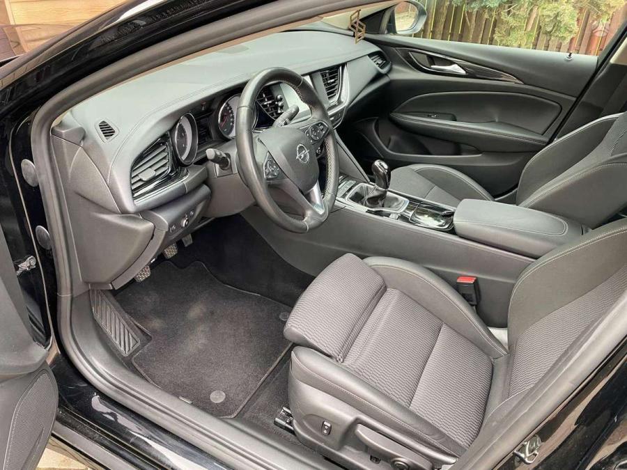 Black Opel Insignia 2019 in Vilnius, with an engine capacity of 1.96 L and mileage of 56 thousand km for 10500 €, photo 17 on AUTOMOTO.COM.LV