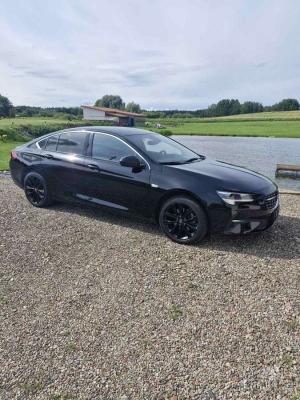 Black Opel Insignia 2022 in Alytus, with an engine capacity of 2.00 L and mileage of 87 thousand km for 15600 €, photo 6 on AUTOMOTO.COM.LV