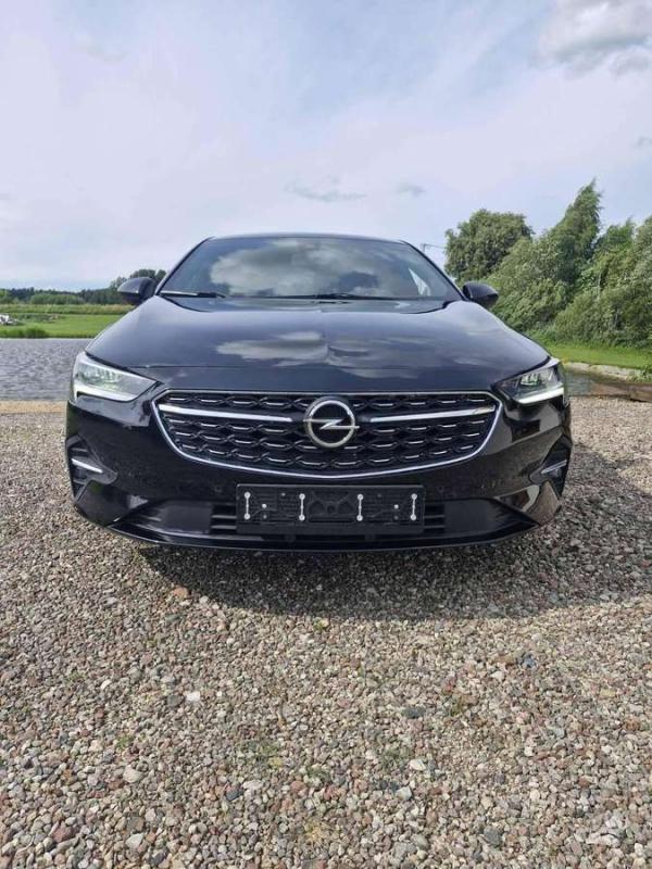 Black Opel Insignia 2022 in Alytus, with an engine capacity of 2.00 L and mileage of 87 thousand km for 15600 €, photo 6 on AUTOMOTO.COM.LV