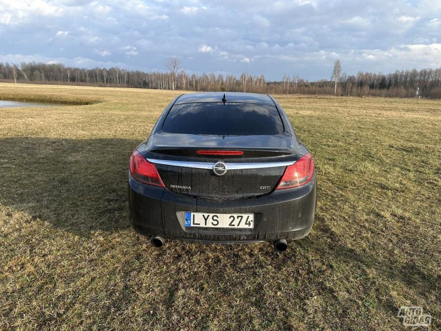 Black Opel Insignia 2009 in Vilnius, with an engine capacity of 2.00 L and mileage of 234 thousand km for 3300 €, photo 16 on AUTOMOTO.COM.LV