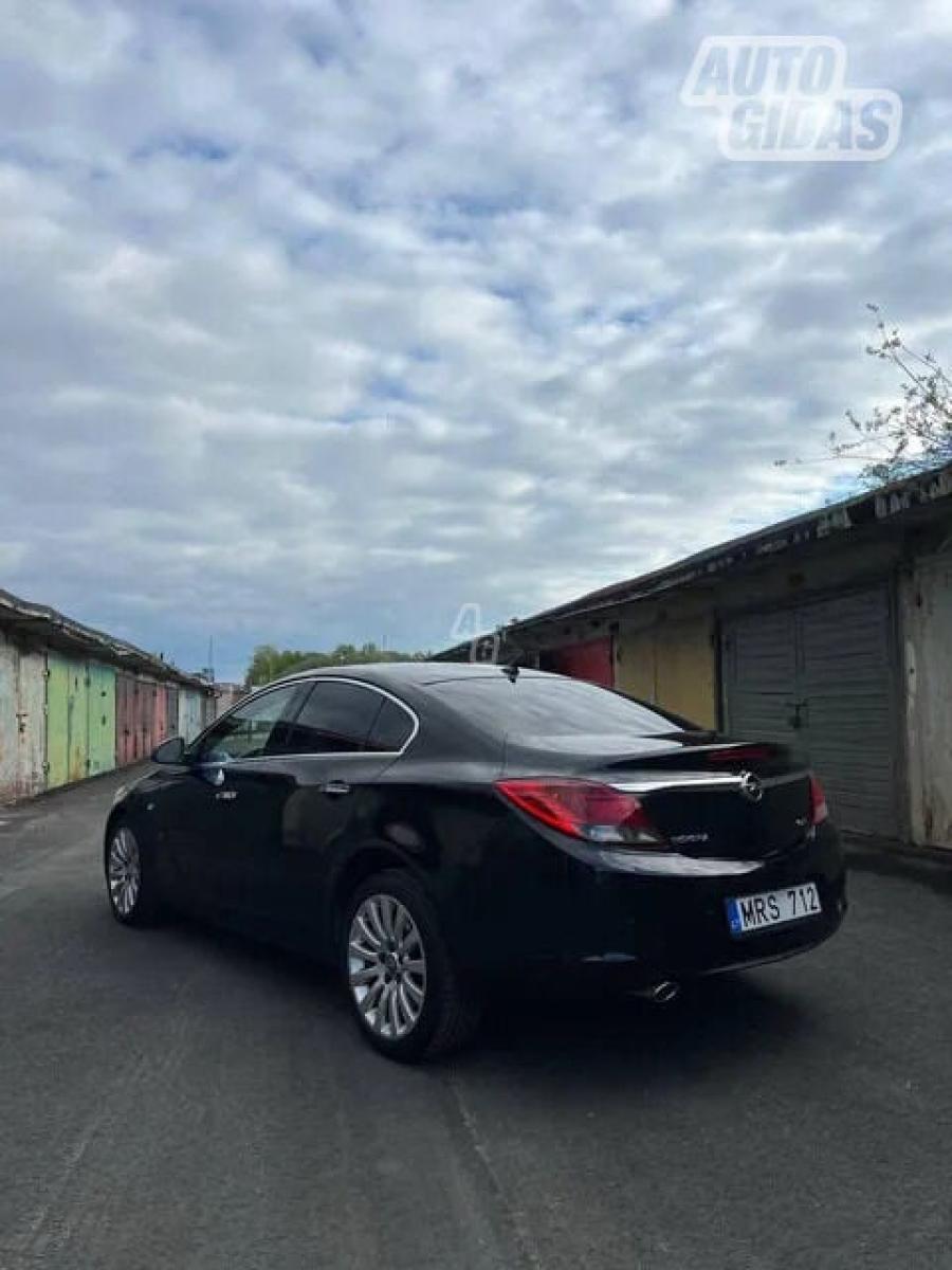 Black Opel Insignia 2009 in Kaunas, with an engine capacity of 2.00 L and mileage of 261 thousand km for 3600 €, photo 6 on AUTOMOTO.COM.LV