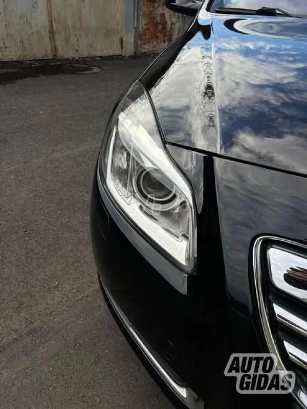 Black Opel Insignia 2009 in Kaunas, with an engine capacity of 2.00 L and mileage of 261 thousand km for 3600 €, photo 6 on AUTOMOTO.COM.LV