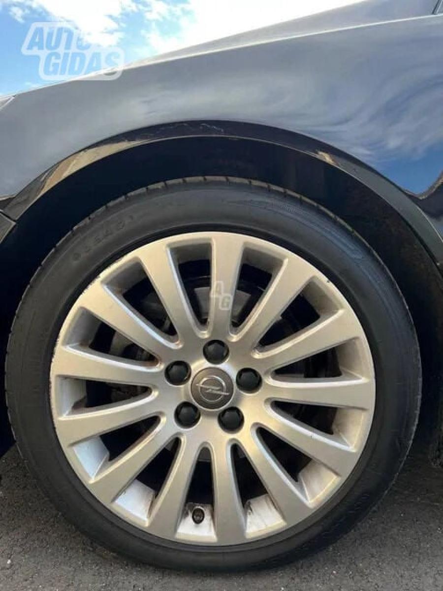 Black Opel Insignia 2009 in Kaunas, with an engine capacity of 2.00 L and mileage of 261 thousand km for 3600 €, photo 10 on AUTOMOTO.COM.LV