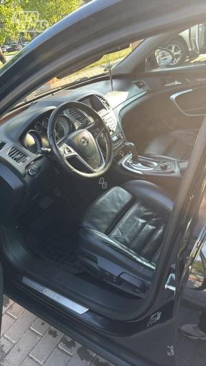 Black Opel Insignia 2009 in Kaunas, with an engine capacity of 2.00 L and mileage of 261 thousand km for 3600 €, photo 13 on AUTOMOTO.COM.LV