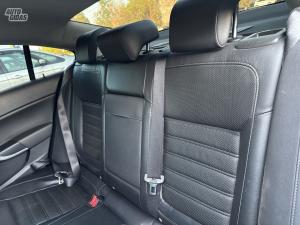Black Opel Insignia 2009 in Kaunas, with an engine capacity of 2.00 L and mileage of 261 thousand km for 3600 €, photo 16 on AUTOMOTO.COM.LV
