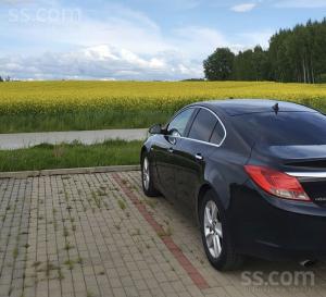 Черный Опель Инсигния 2009 в Рига, объемом двигателя 2.00 л и пробегом 252 тыс. км за 3650 €, фото 13 на AUTOMOTO.COM.LV
