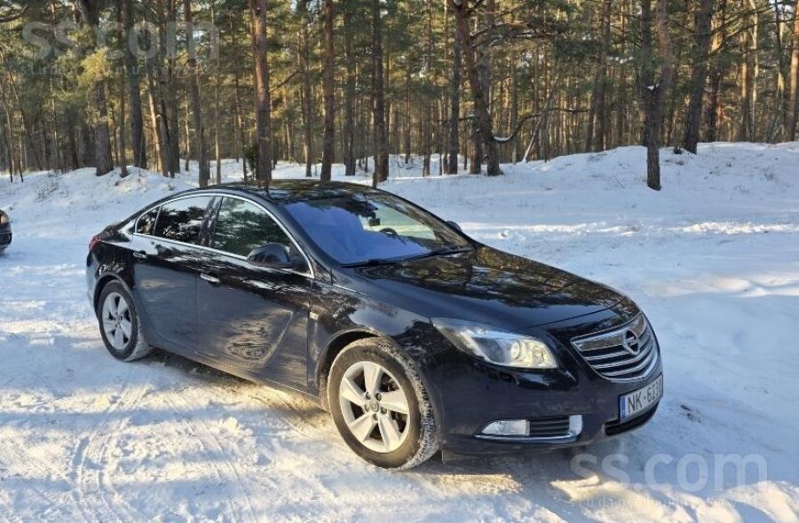 Черный Опель Инсигния 2009 в Рига, объемом двигателя 2.00 л и пробегом 252 тыс. км за 3650 €, фото 15 на AUTOMOTO.COM.LV