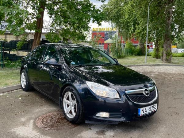 Black Opel Insignia 2009 in Riga, with an engine capacity of 2.00 L and mileage of 0 thousand km for 4900 €, photo 3 on AUTOMOTO.COM.LV