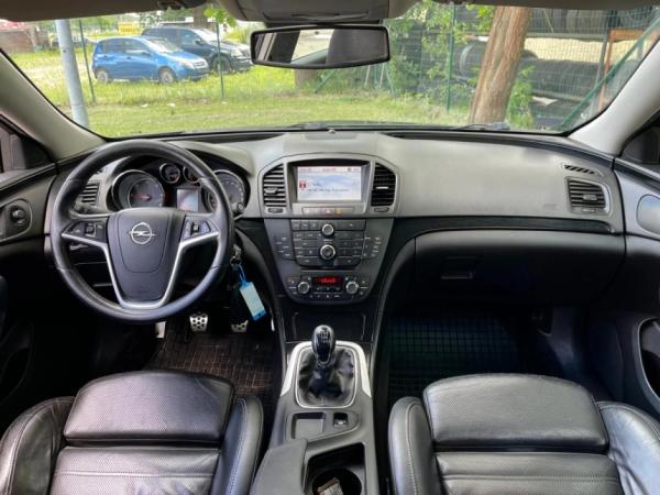 Black Opel Insignia 2009 in Riga, with an engine capacity of 2.00 L and mileage of 0 thousand km for 4900 €, photo 6 on AUTOMOTO.COM.LV