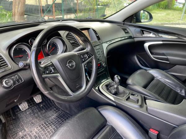 Black Opel Insignia 2009 in Riga, with an engine capacity of 2.00 L and mileage of 0 thousand km for 4900 €, photo 7 on AUTOMOTO.COM.LV