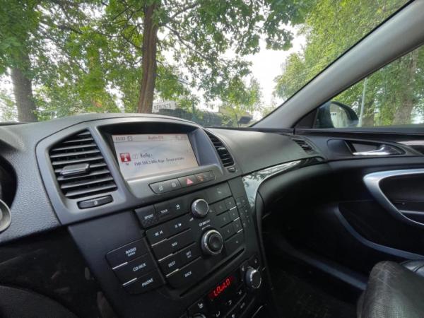 Black Opel Insignia 2009 in Riga, with an engine capacity of 2.00 L and mileage of 0 thousand km for 4900 €, photo 10 on AUTOMOTO.COM.LV