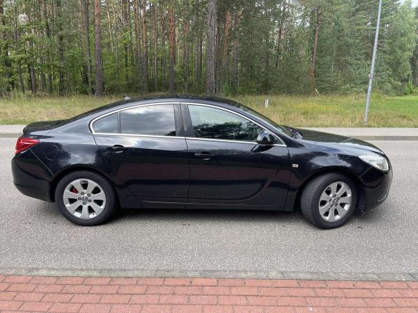 Black Opel Insignia 2009 in Druskininkai, with an engine capacity of 1.96 L and mileage of 233 thousand km for 2990 €, photo 2 on AUTOMOTO.COM.LV