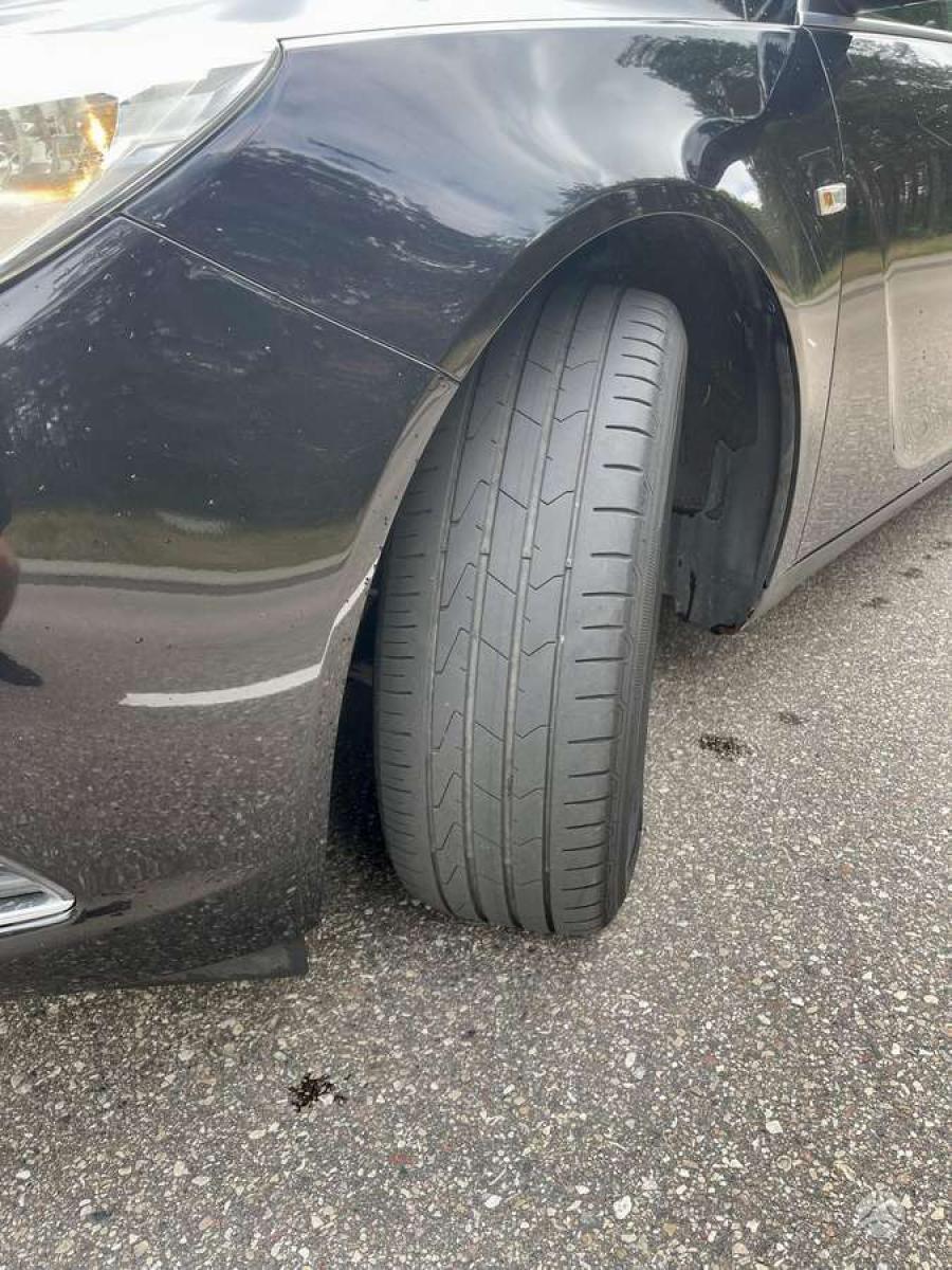 Black Opel Insignia 2009 in Druskininkai, with an engine capacity of 1.96 L and mileage of 233 thousand km for 2990 €, photo 10 on AUTOMOTO.COM.LV