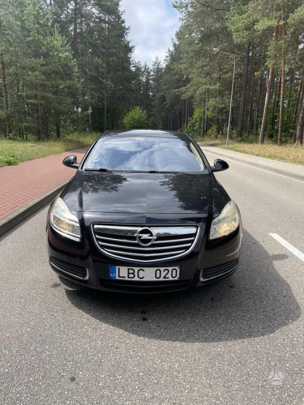 Black Opel Insignia 2009 in Druskininkai, with an engine capacity of 1.96 L and mileage of 233 thousand km for 2990 €, photo 10 on AUTOMOTO.COM.LV
