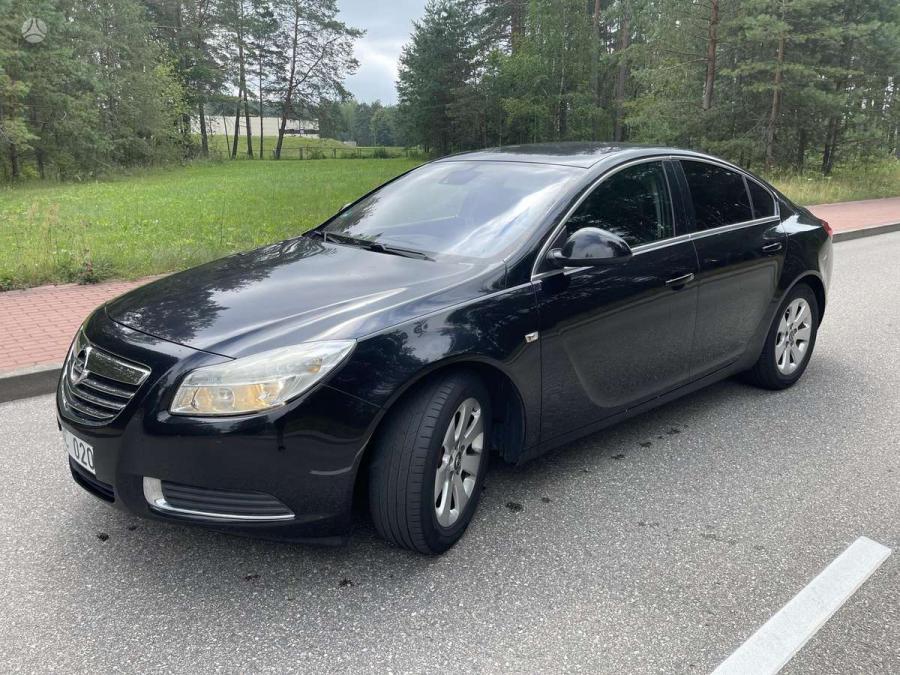 Black Opel Insignia 2009 in Druskininkai, with an engine capacity of 1.96 L and mileage of 233 thousand km for 2990 €, photo 12 on AUTOMOTO.COM.LV