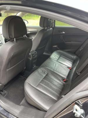 Black Opel Insignia 2009 in Druskininkai, with an engine capacity of 1.96 L and mileage of 233 thousand km for 2990 €, photo 17 on AUTOMOTO.COM.LV