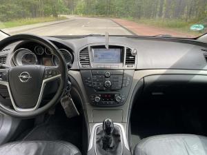 Black Opel Insignia 2009 in Druskininkai, with an engine capacity of 1.96 L and mileage of 233 thousand km for 2990 €, photo 18 on AUTOMOTO.COM.LV