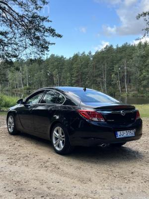 Melns Opel Insignia 2009 Rīga, ar dzinēja tilpumu 2.00 L un nobraukumu 281 tūkst. km par 2250 €, foto 4 vietnē AUTOMOTO.COM.LV