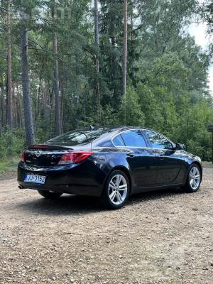 Melns Opel Insignia 2009 Rīga, ar dzinēja tilpumu 2.00 L un nobraukumu 281 tūkst. km par 2250 €, foto 5 vietnē AUTOMOTO.COM.LV