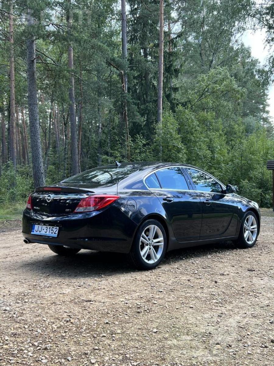Melns Opel Insignia 2009 Rīga, ar dzinēja tilpumu 2.00 L un nobraukumu 281 tūkst. km par 2250 €, foto 5 vietnē AUTOMOTO.COM.LV